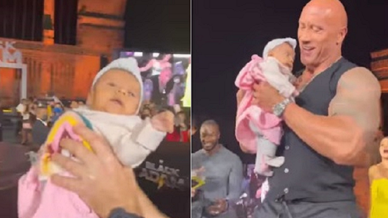 Il Padre è Fan Di Dwayne Johnson E Fa Passare La Sua Neonata Tra La Folla Per Dargliela In